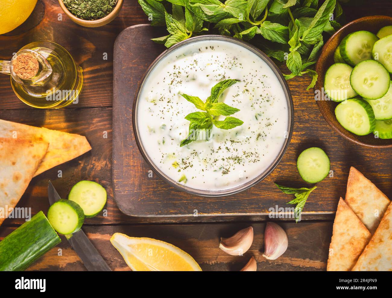 Arabic Cuisine; Traditional yogurt cucumber salad. It consisting of ...