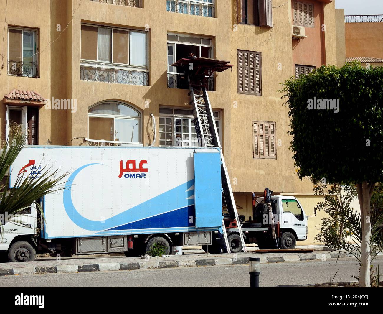 Cairo, Egypt, May 11 2023: Electric lifting winch vehicle for furniture ...