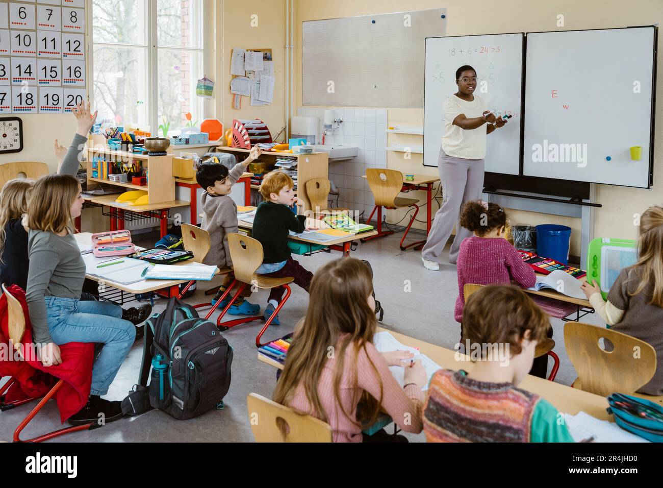 Female teacher talking hi-res stock photography and images - Alamy