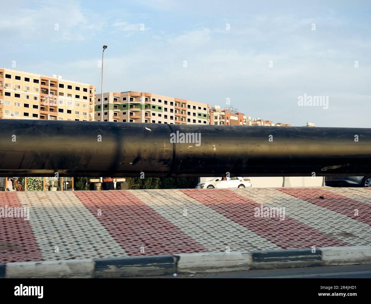 Cairo, Egypt, May 18 2023: preparations to place large water pipe parts ...