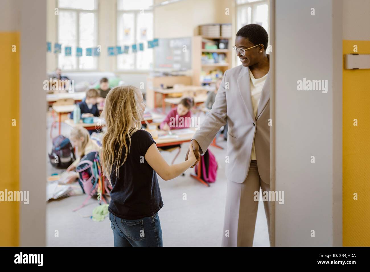 Two girls in classroom on school desk hi-res stock photography and ...