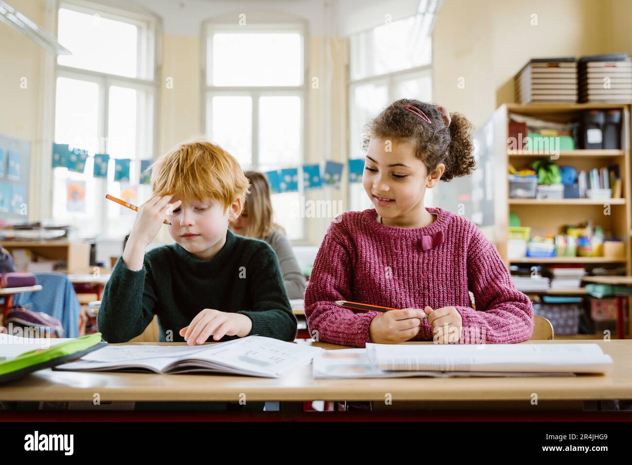 Confused Child In Classroom