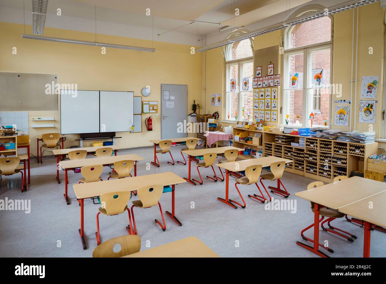 Neat classroom with racks and furniture at school Stock Photo - Alamy