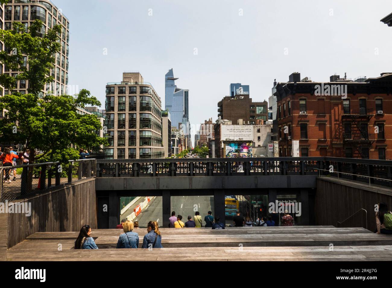 The 10th Ave. square and overlook provides a view north to Hudson yards ...