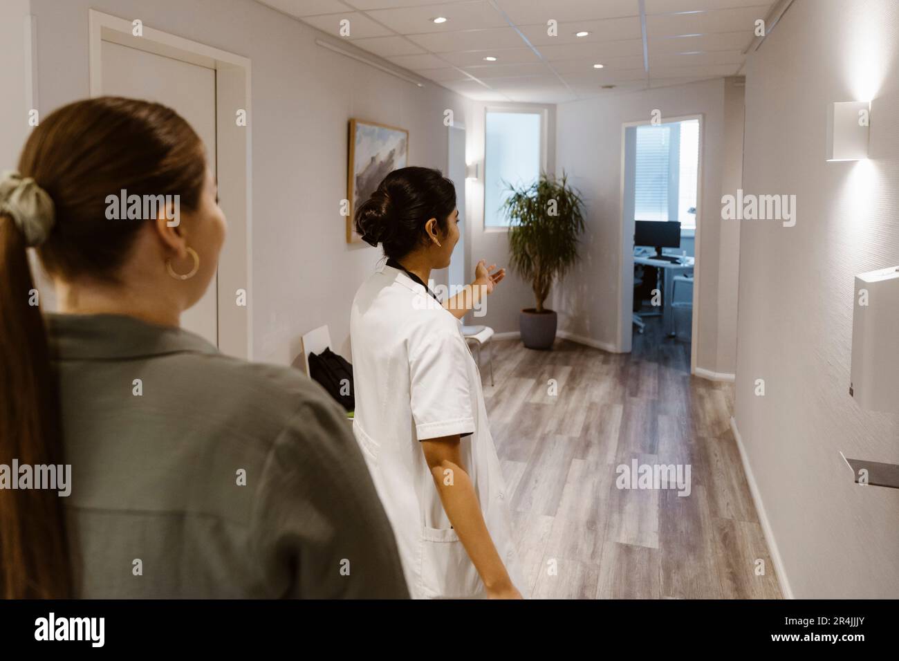 Doctor escorting hi-res stock photography and images - Alamy