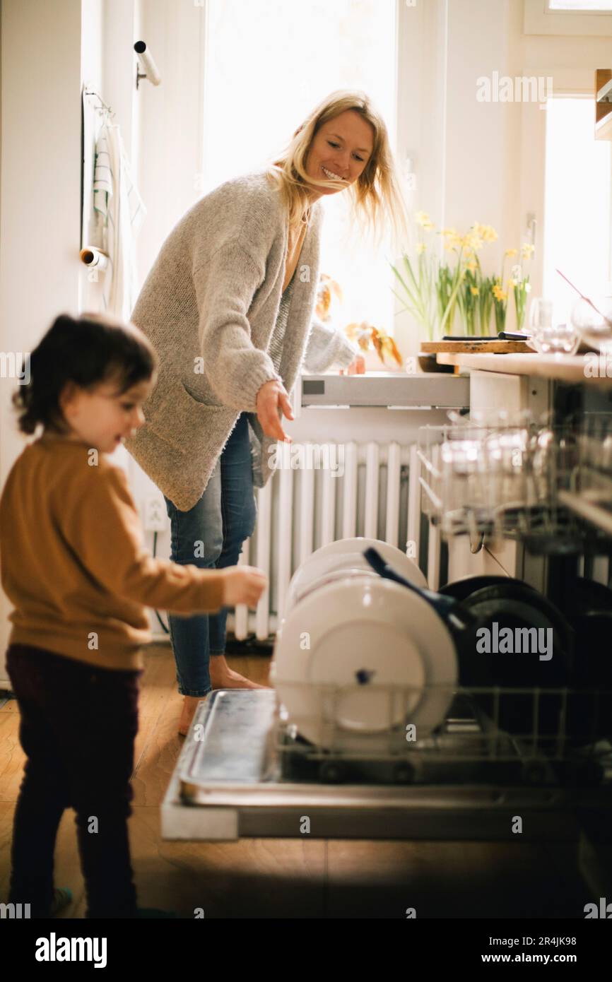 Mother washing adult son hi-res stock photography and images - Alamy
