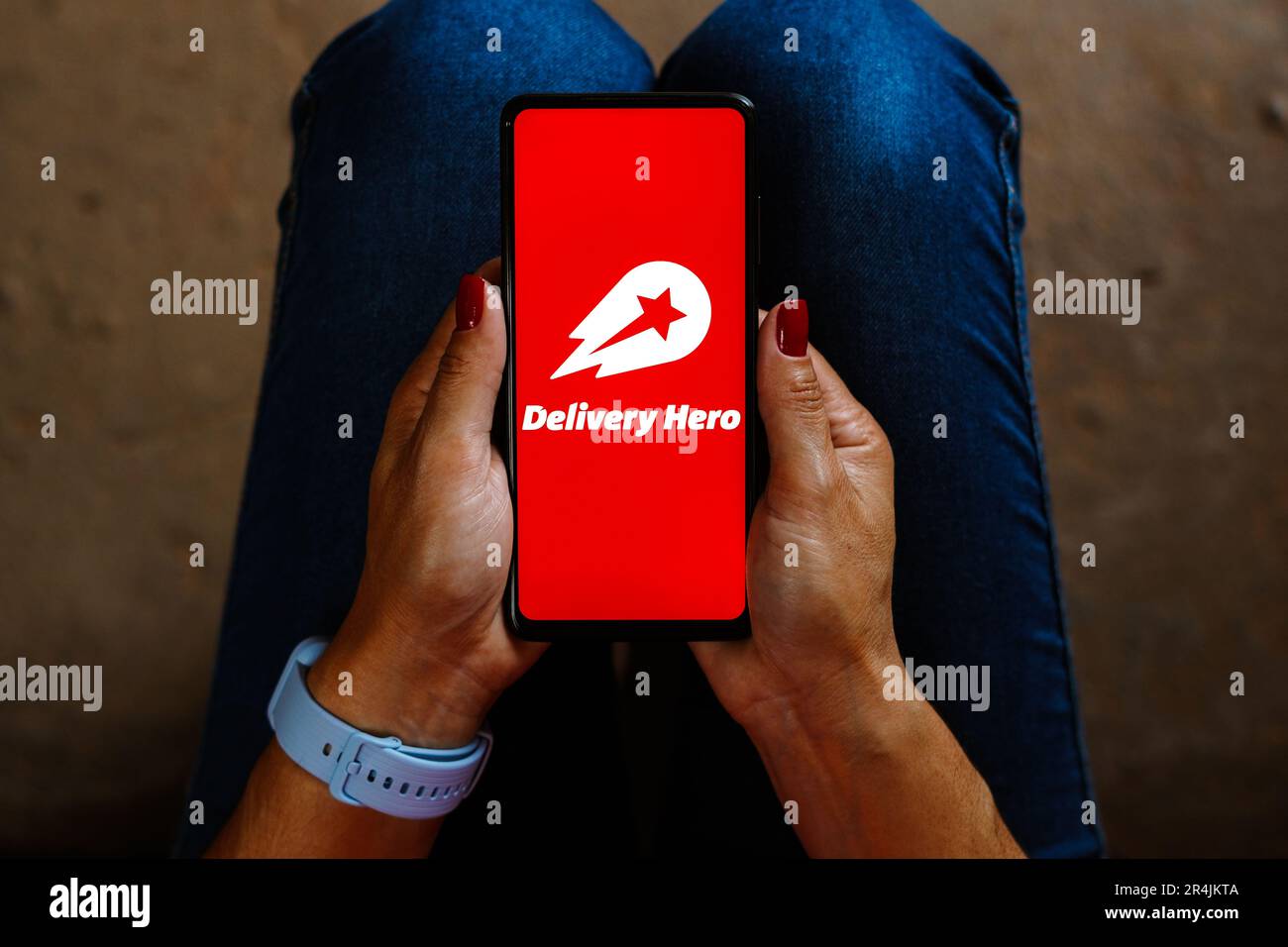 In this photo illustration, the Delivery Hero logo is displayed on a ...