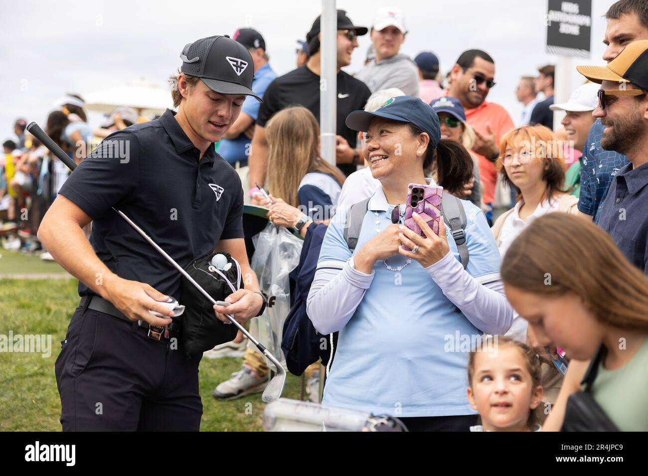 James Piot of HyFlyers GC signs autographs for fans during the final ...