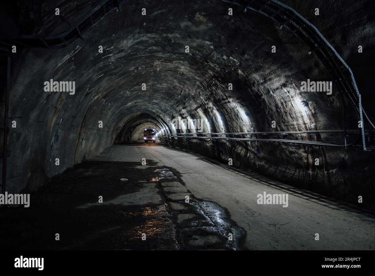 Bus inside old underground road tunnel inside mountain Stock Photo - Alamy