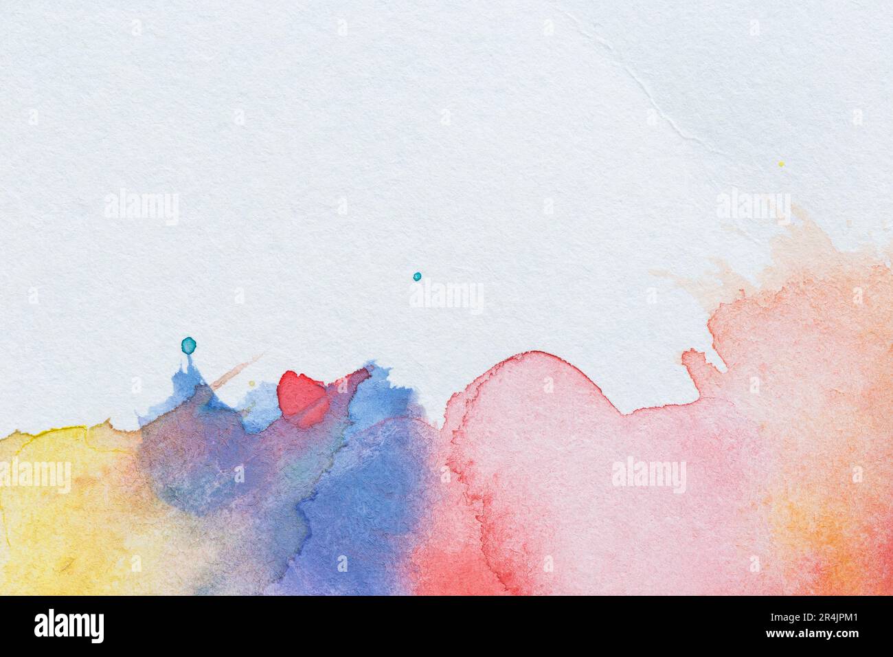 Macro close-up of abstract colorful watercolors with splashes ...