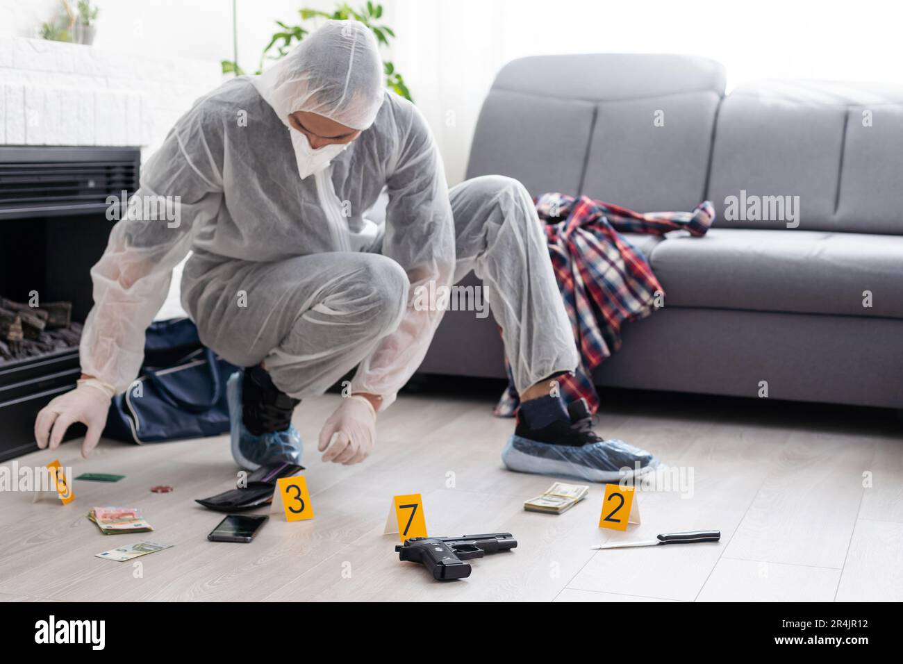 Detective Collecting Evidence in a Crime Scene. Forensic Specialists ...