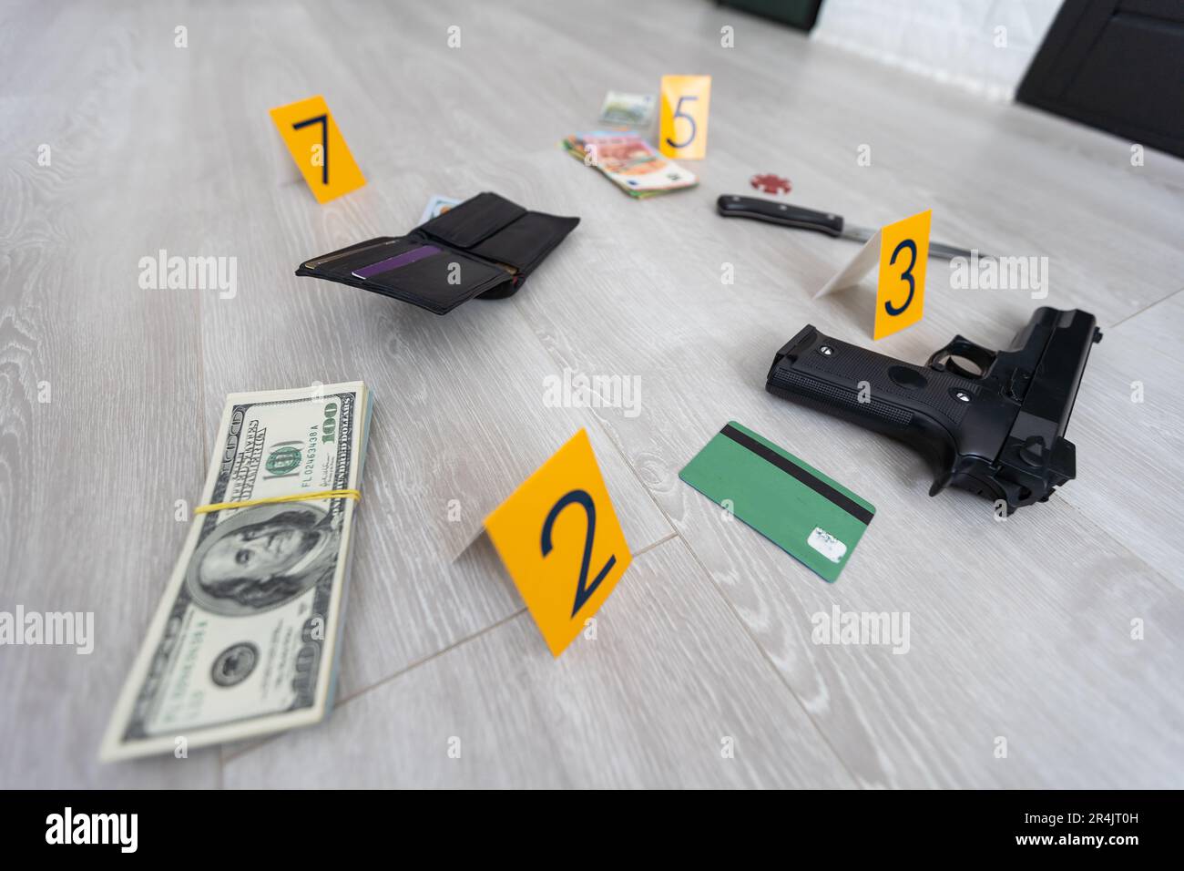 High contrast image of a crime scene with evidence markers Stock Photo ...