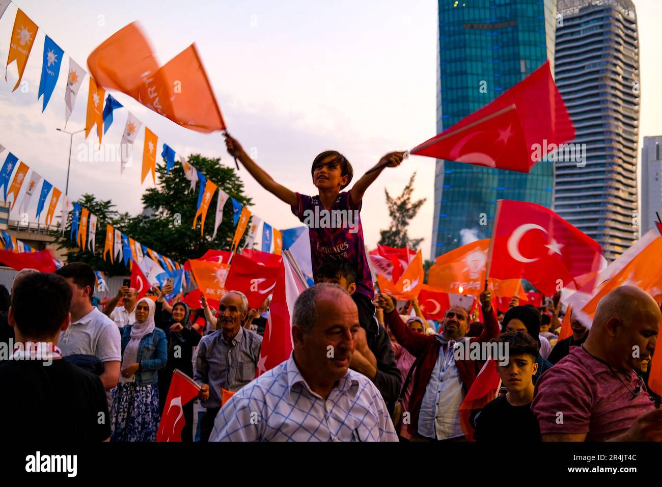 Izmir, Turkey. 28th May, 2023. A child waves flags during the ...