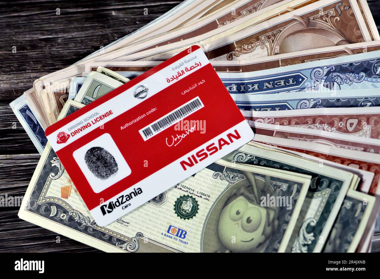 Cairo, Egypt, May 26 2023: KidZos money, Driving license of KidZania, a ...