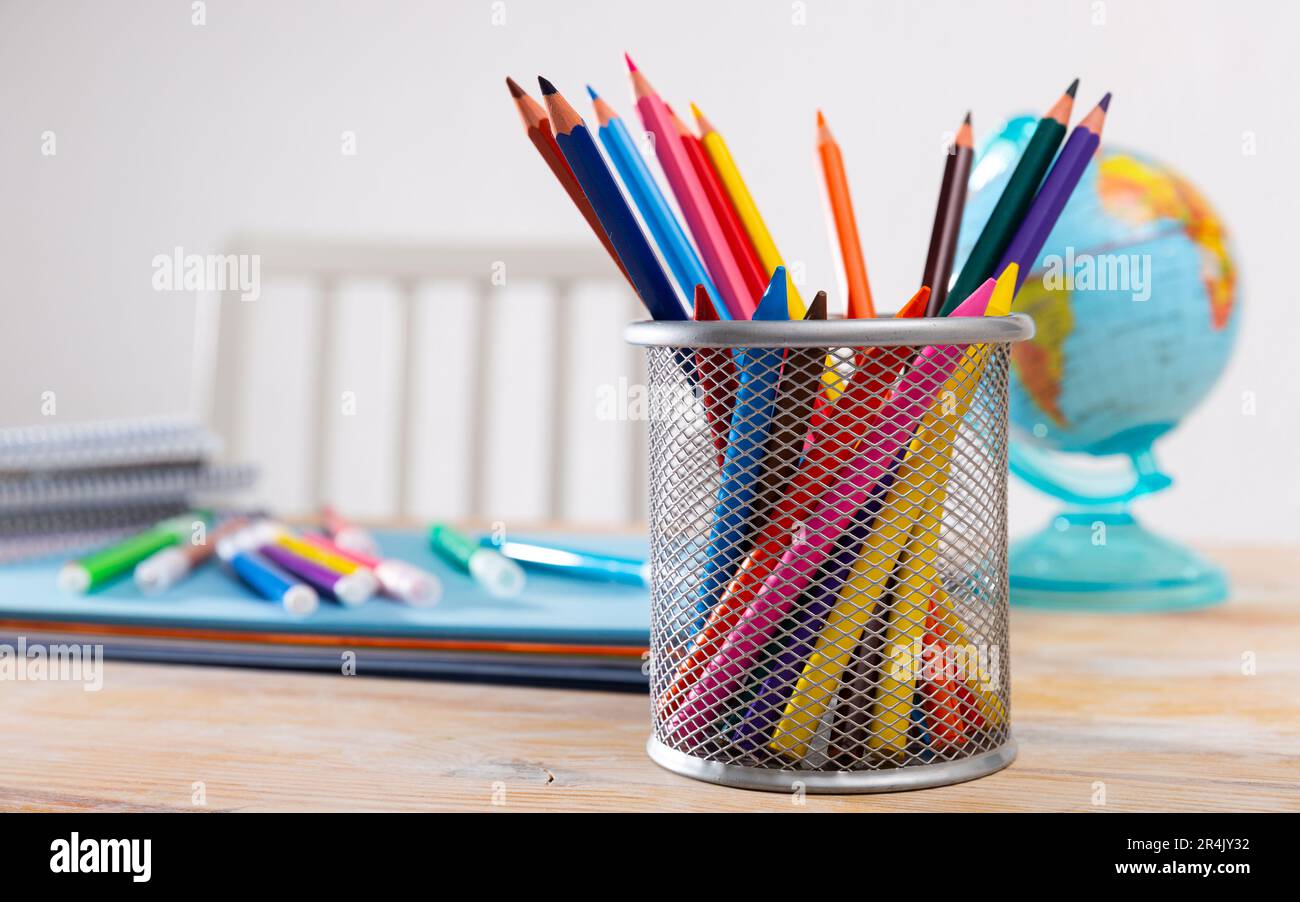 School stationery on desk Stock Photo - Alamy