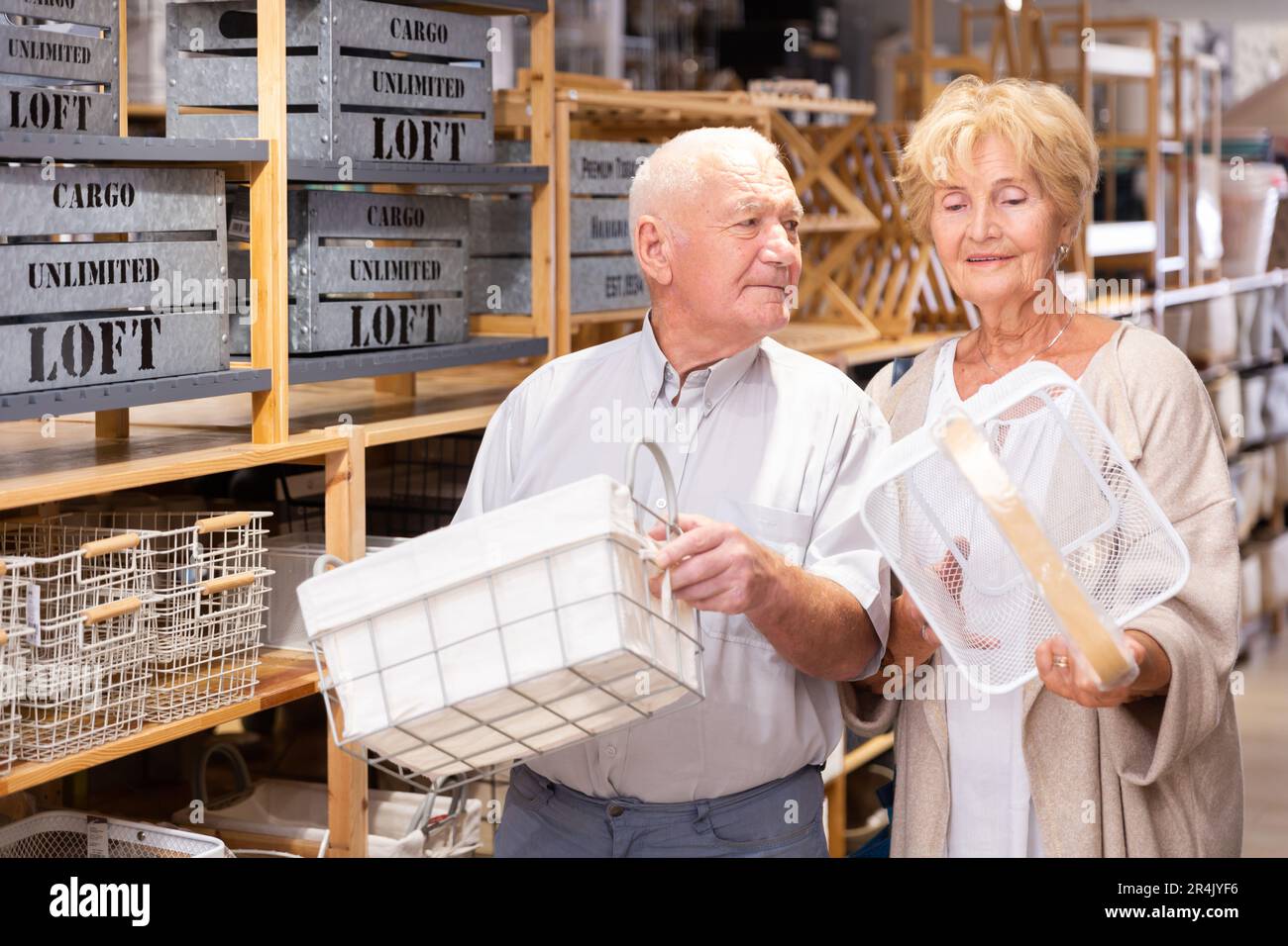 Senior couple choosing storage hi-res stock photography and images - Alamy