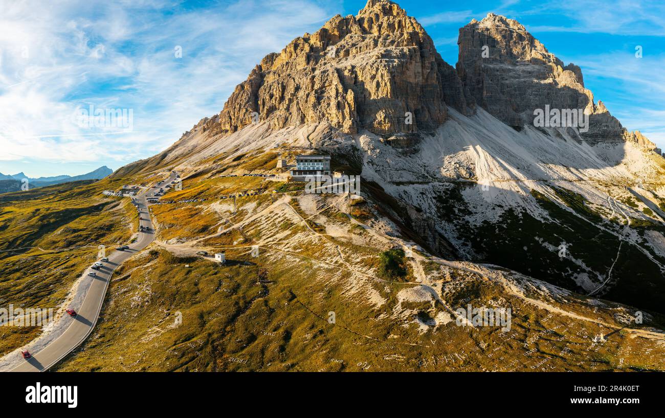 Aerial View of Tre Cime di Lavaredo, Serpentine Road Embraces Majestic ...