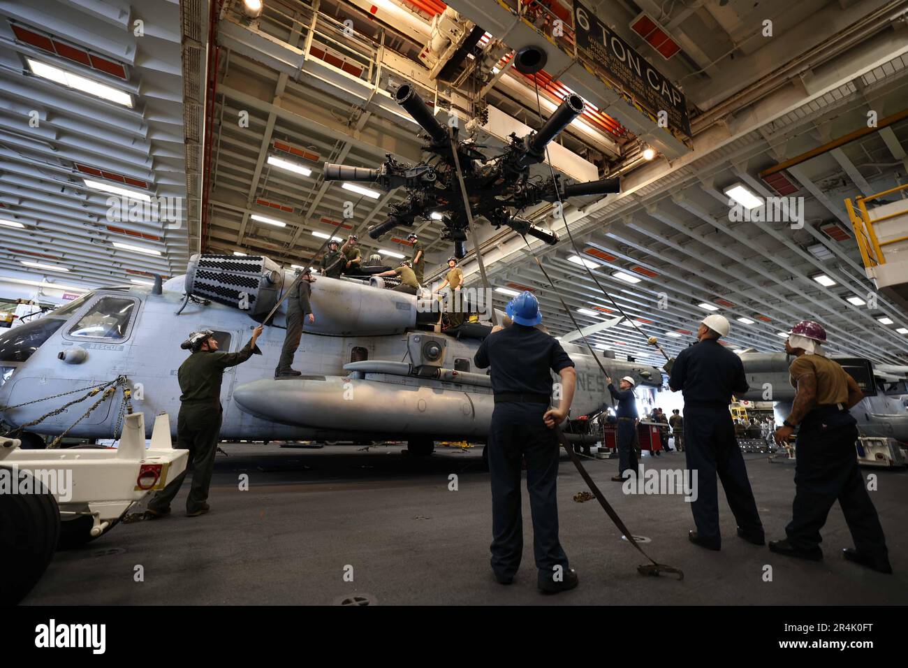 ATLANTIC OCEAN (May 26, 2023) Sailors and Marines re-install a CH-53E ...