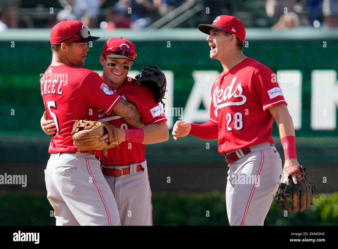 Cincinnati Reds' Matt McLain, center, celebrates with Nick Senzel, left ...