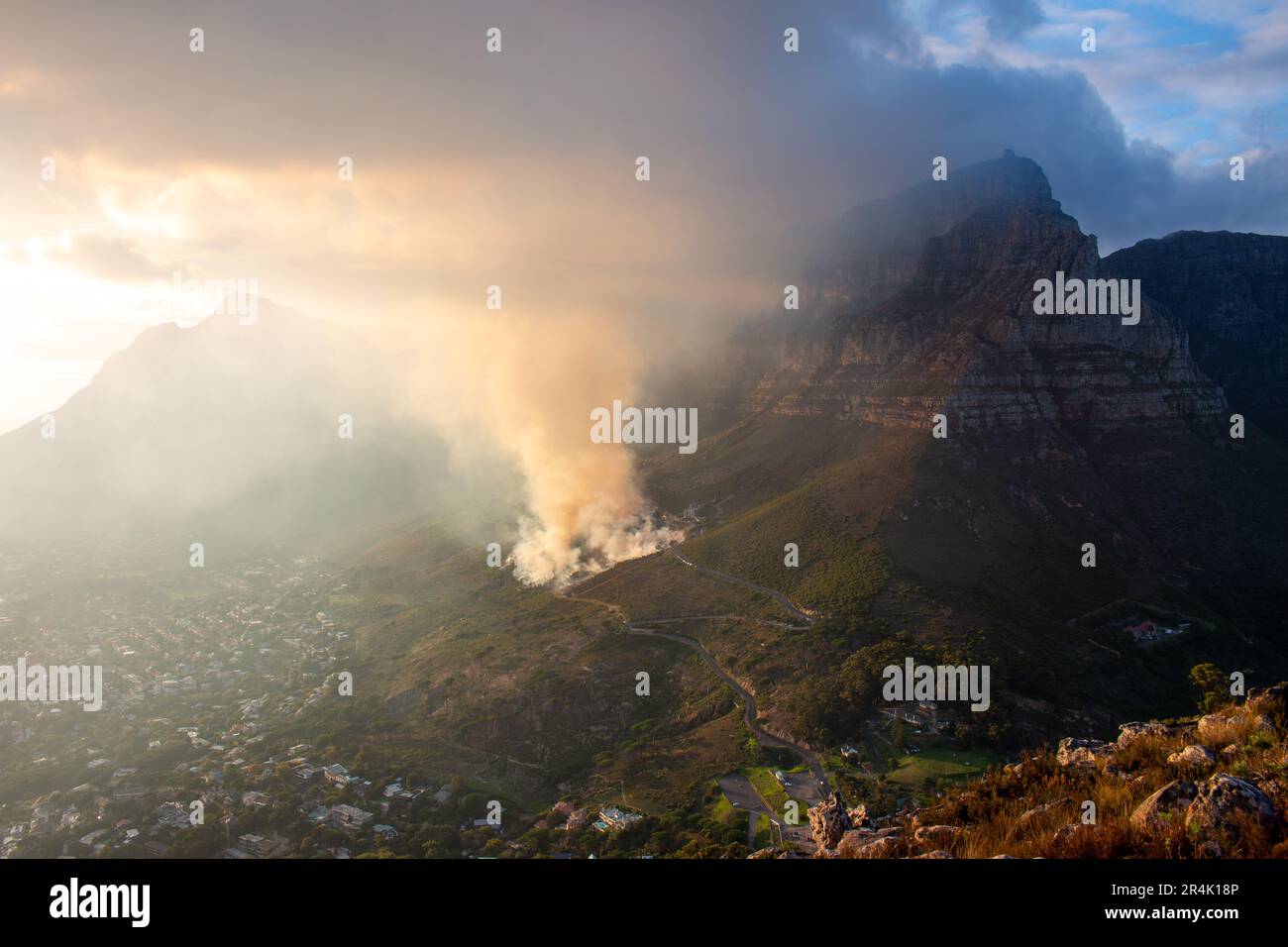 Smoke from a controlled burn at the foot of Table Mountain in Cape Town ...
