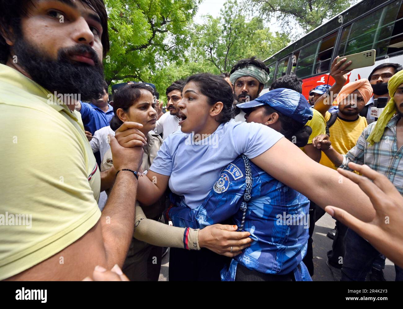 NEW DELHI, INDIA - MAY 28: Security personnel detain wrestler Sakshi ...