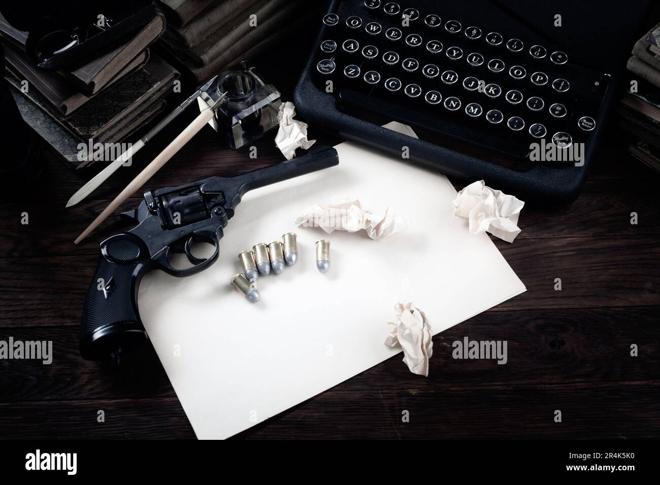 Antique typewriter and revolver gun with ammunitions, books, blank ...