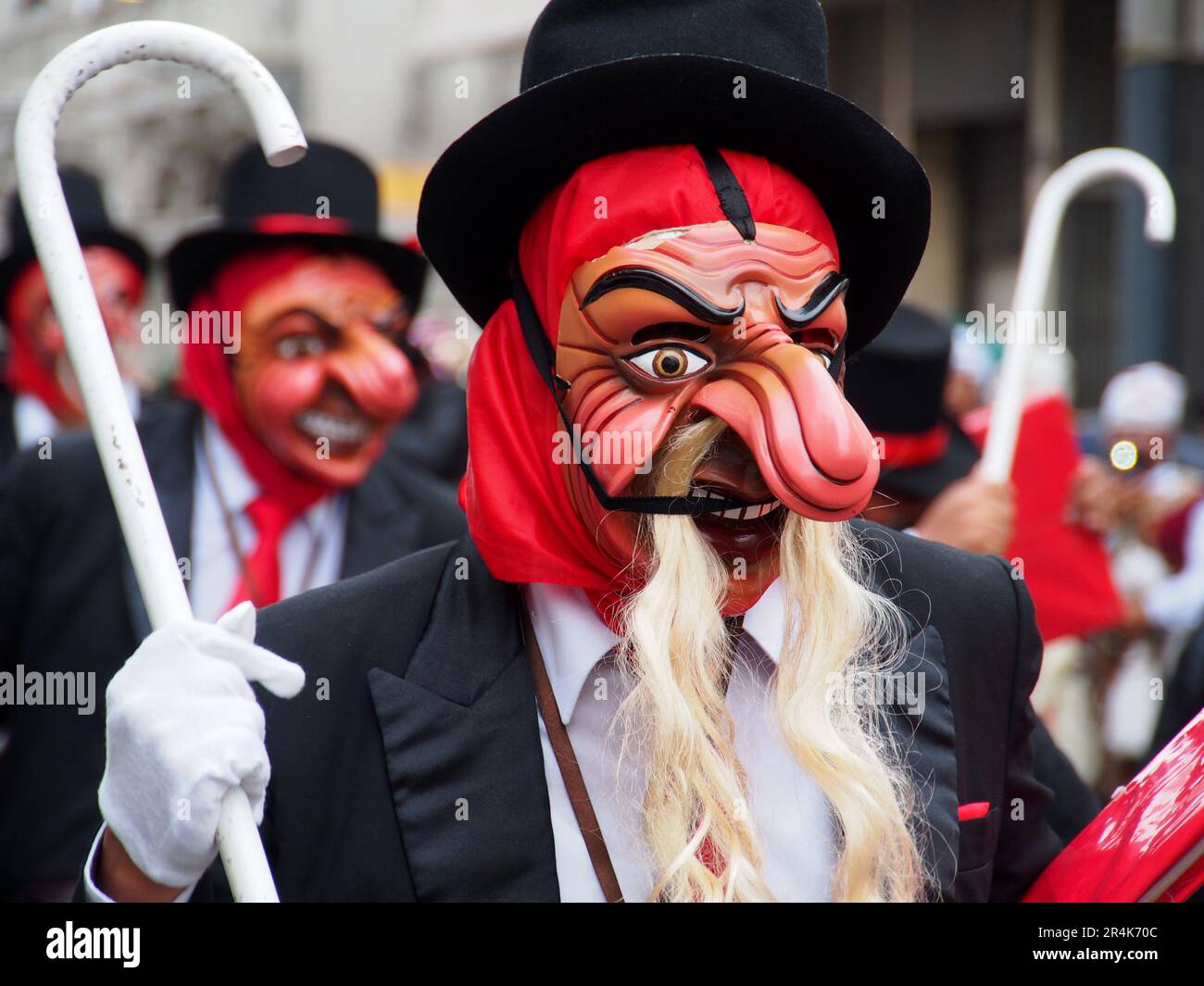 Lima, Peru. 28th May, 2023. Group of men with huge noses masks ...