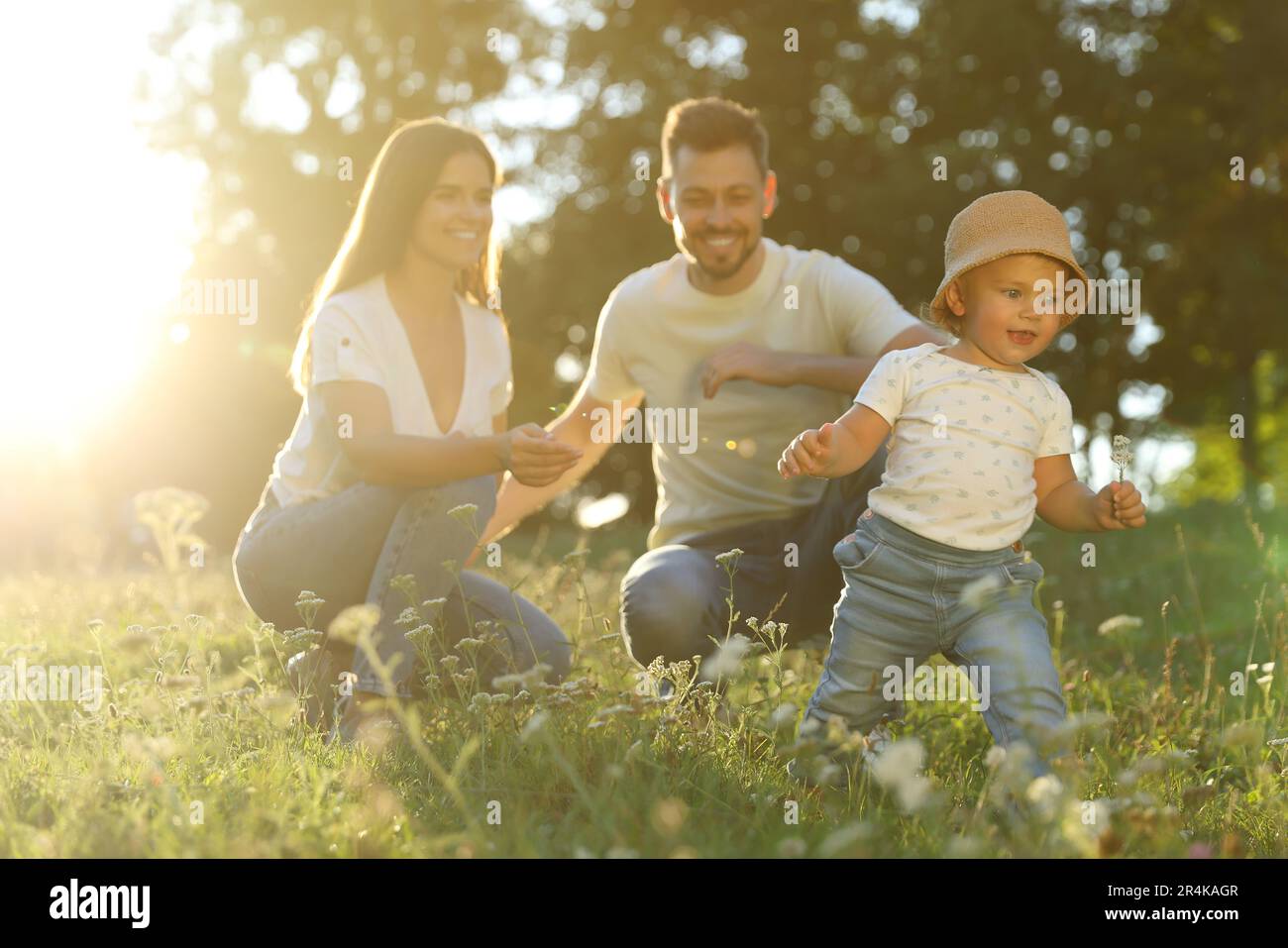 Happy caucasian parents park baby hi-res stock photography and images ...