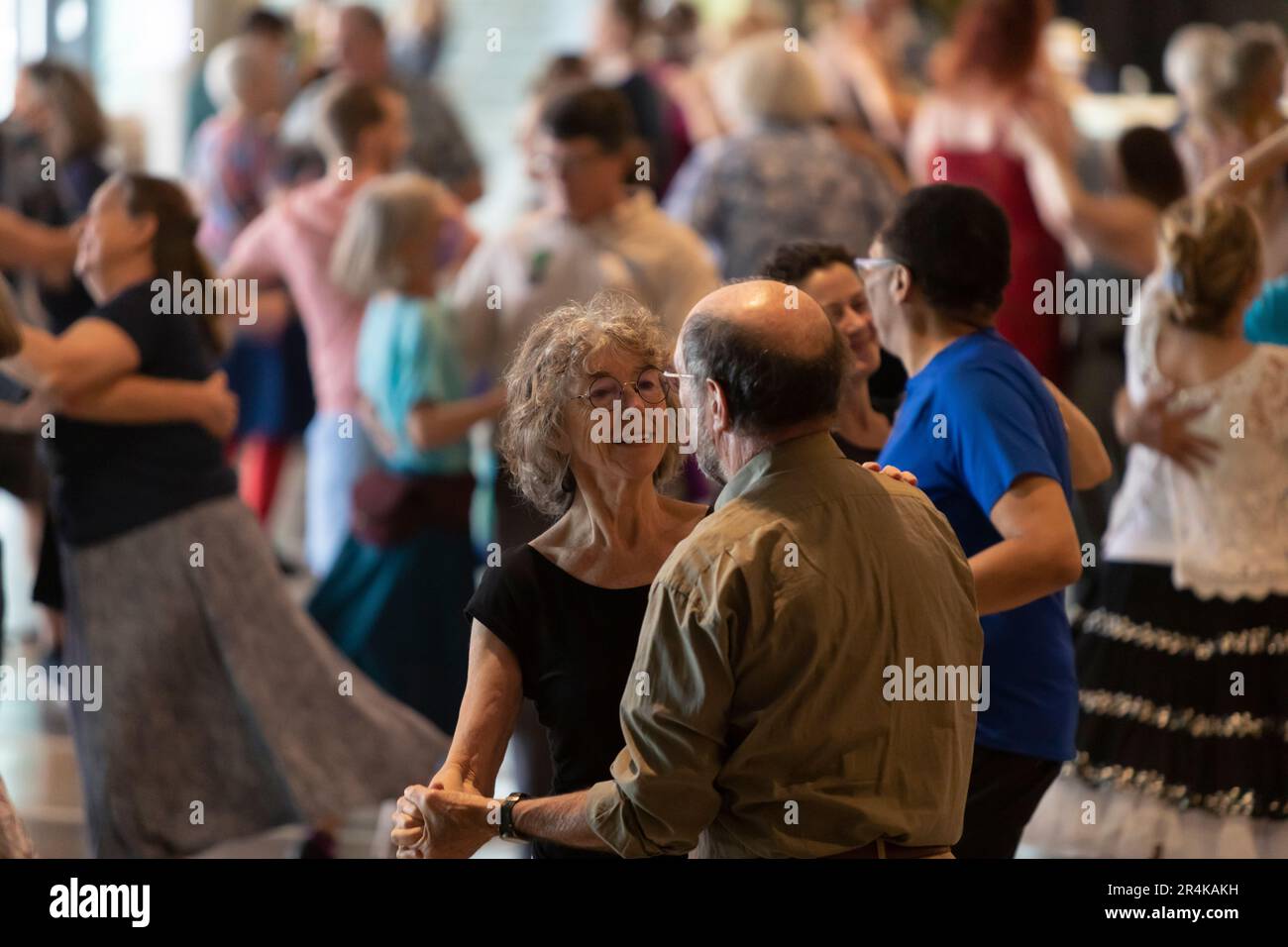 Seattle, Washington, USA. 28th May, 2023. Visitors enjoy a contra dance ...
