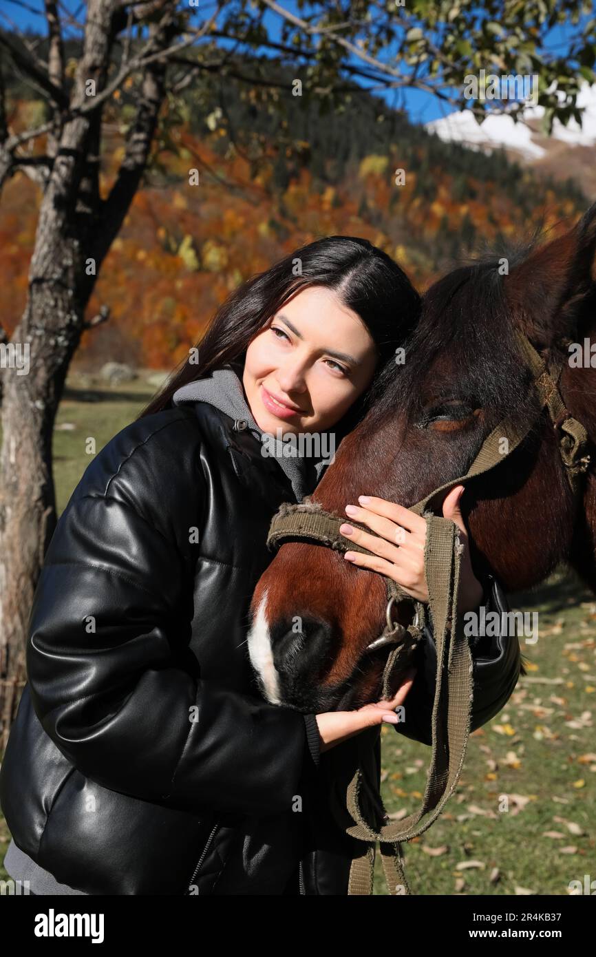Hugging horse hi-res stock photography and images - Alamy