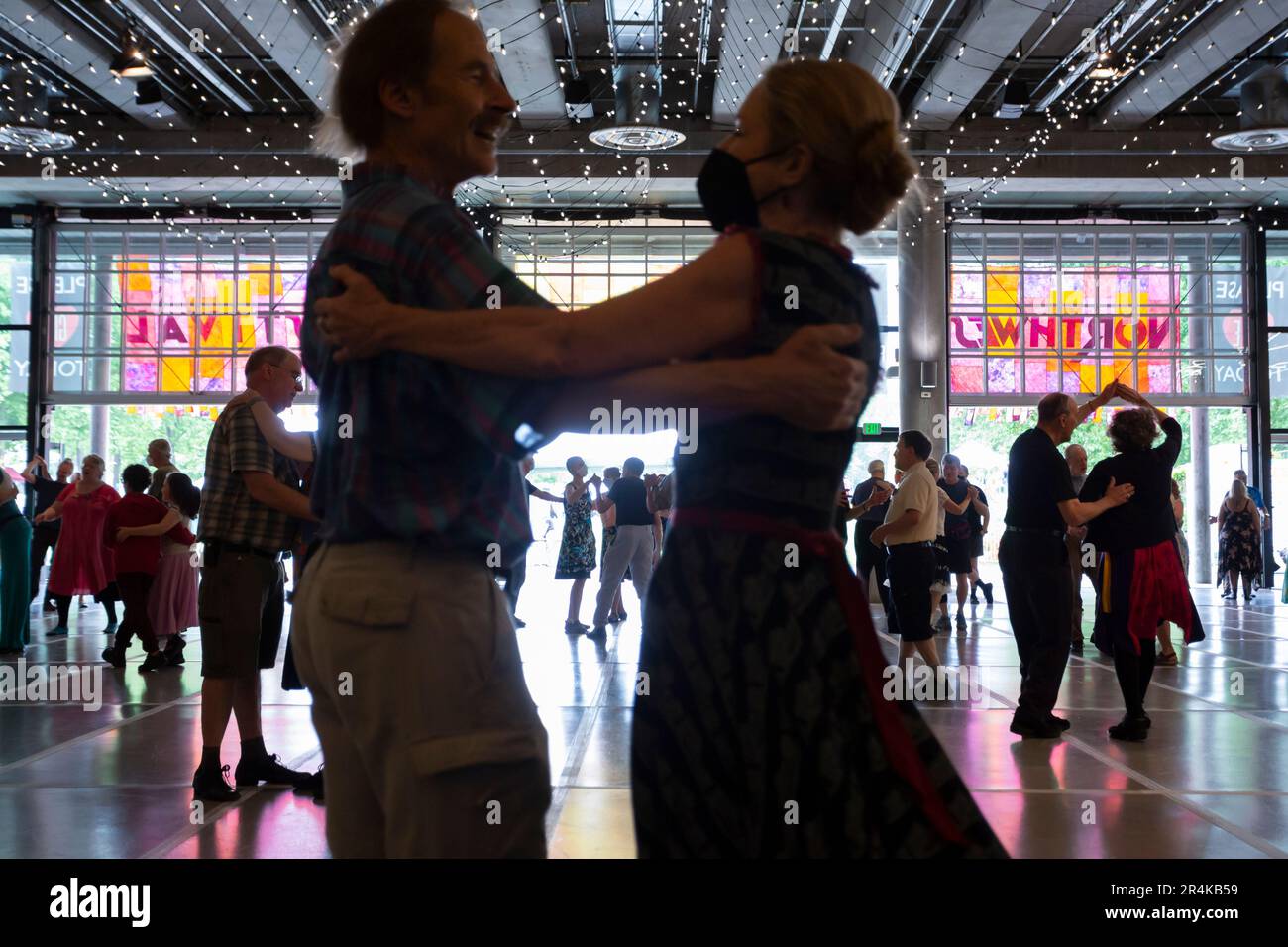 Seattle, Washington, USA. 28th May, 2023. Visitors enjoy a contra dance ...