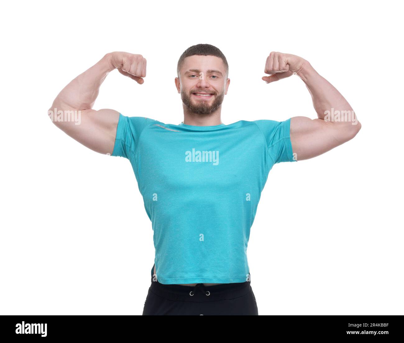 Strong man showing muscles white hi-res stock photography and images ...