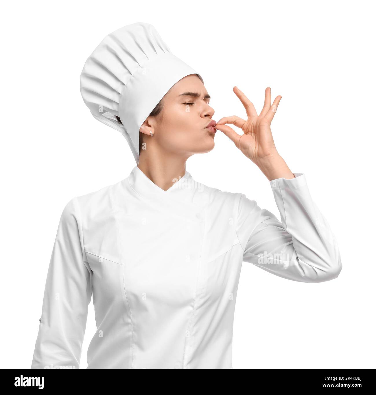 Female chef showing perfect sign on white background Stock Photo - Alamy