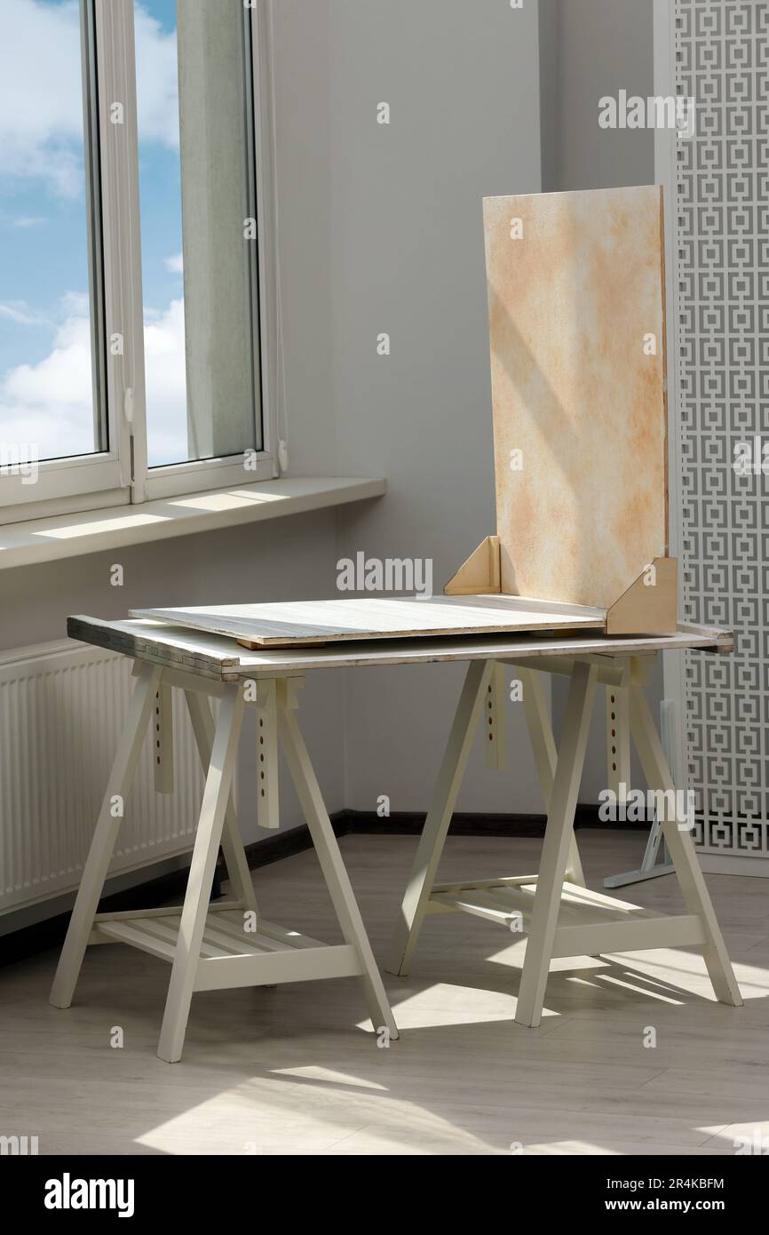 Double-sided backdrop on table in photo studio Stock Photo - Alamy