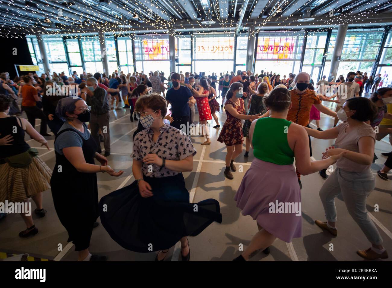 Seattle, Washington, USA. 28th May, 2023. Visitors enjoy a contra dance ...