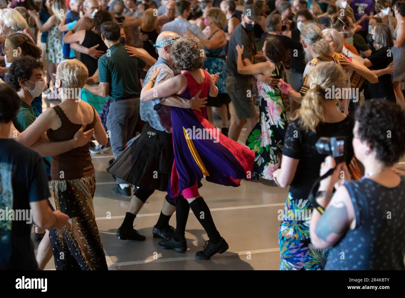 Seattle, Washington, USA. 28th May, 2023. Visitors enjoy a contra dance ...
