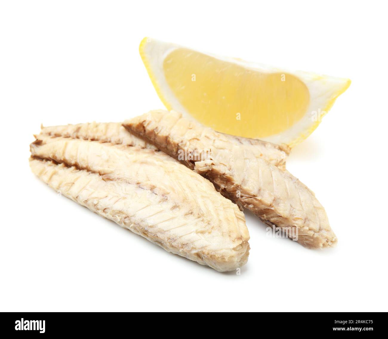 Canned mackerel fillets with lemon on white background Stock Photo - Alamy