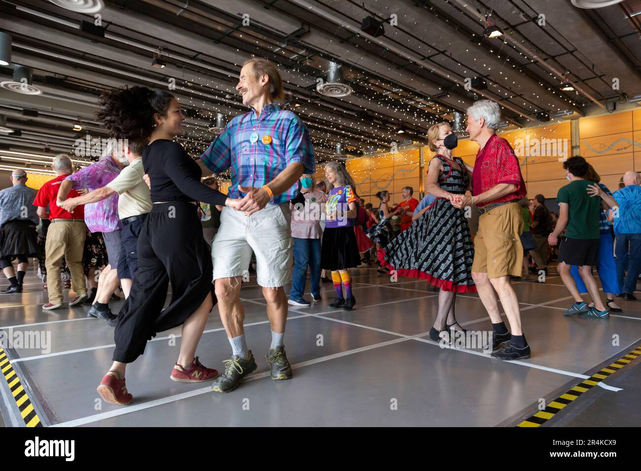 Seattle, Washington, USA. 28th May, 2023. Visitors enjoy a contra dance ...