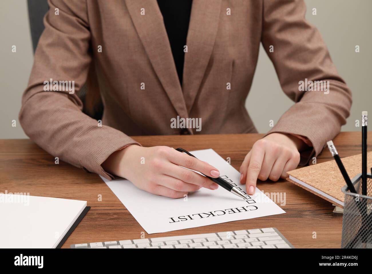 Woman filling checklist table hi-res stock photography and images - Alamy