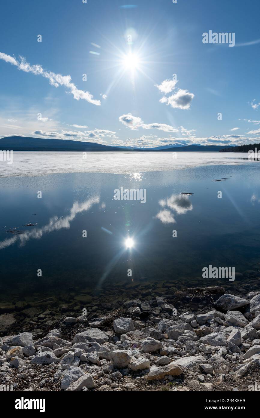 Stunning spring time lake reflections in beautiful calm pristine nature ...