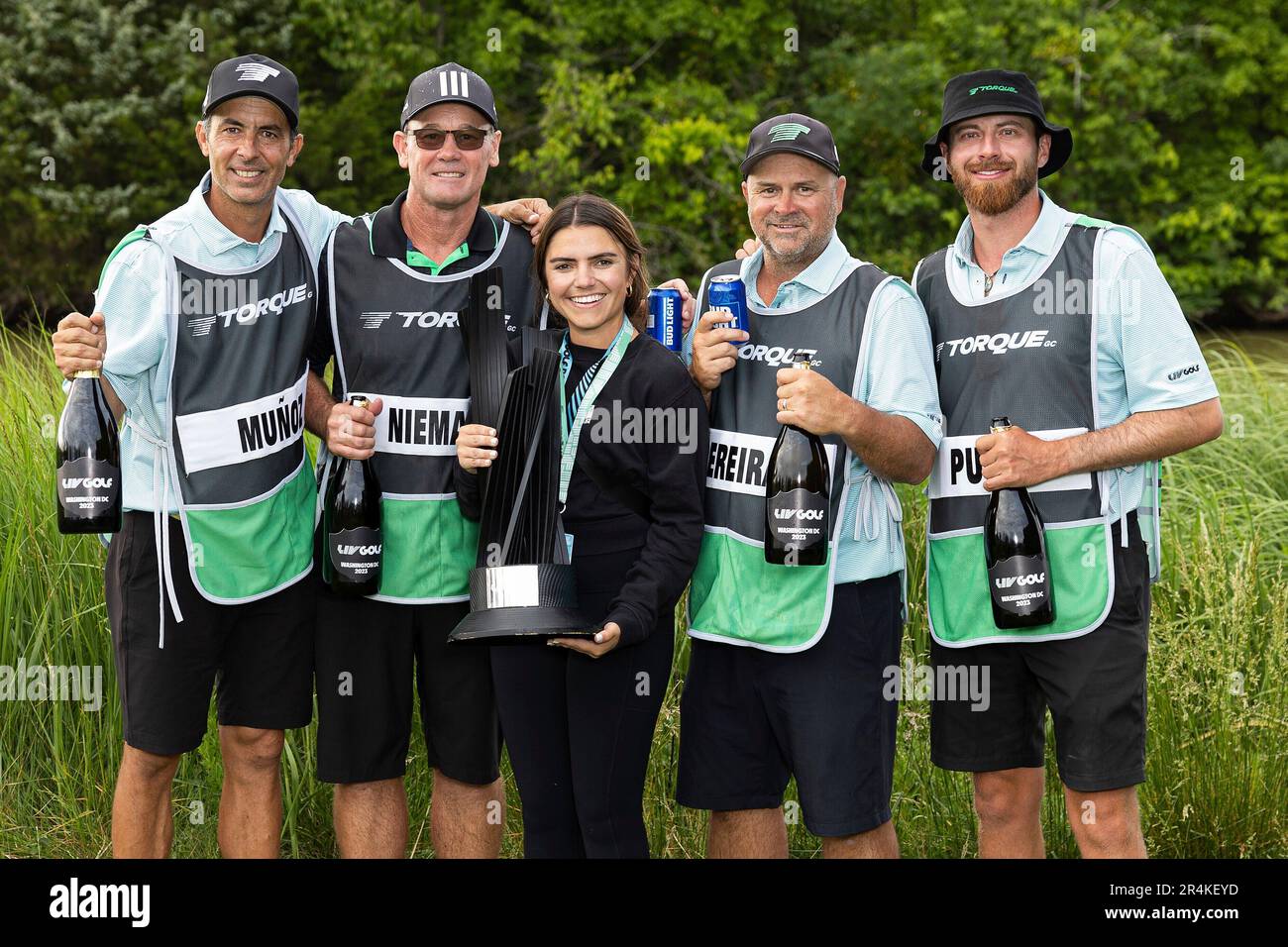 Torque GC caddies and social media manager pose for a photo with the ...
