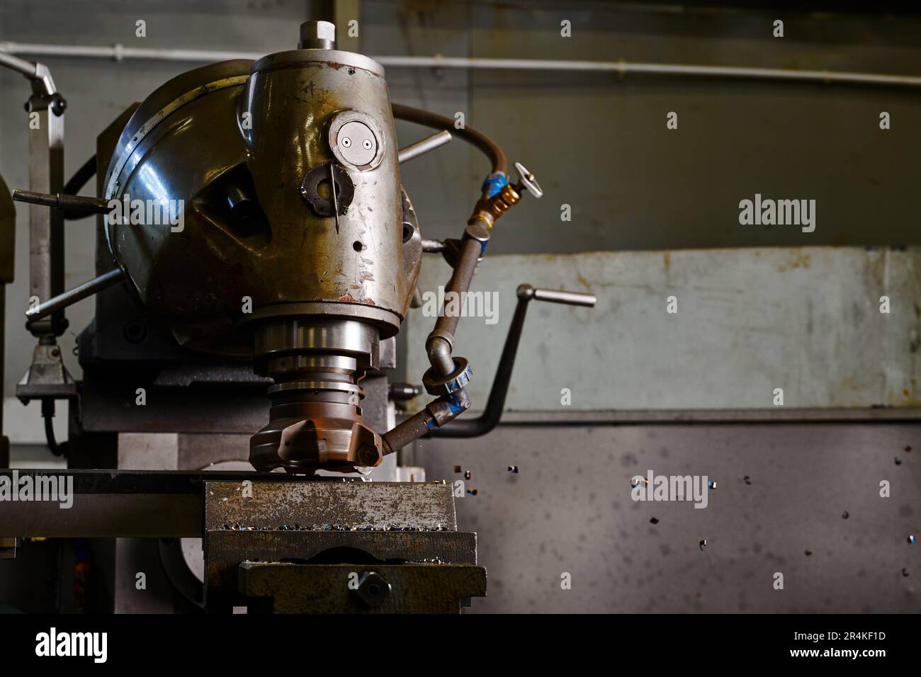 Old vertical milling machine in plant workshop closeup Stock Photo - Alamy