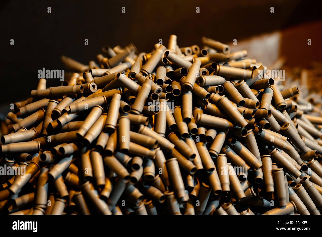 Shell casings ammunition production workshop Stock Photo - Alamy