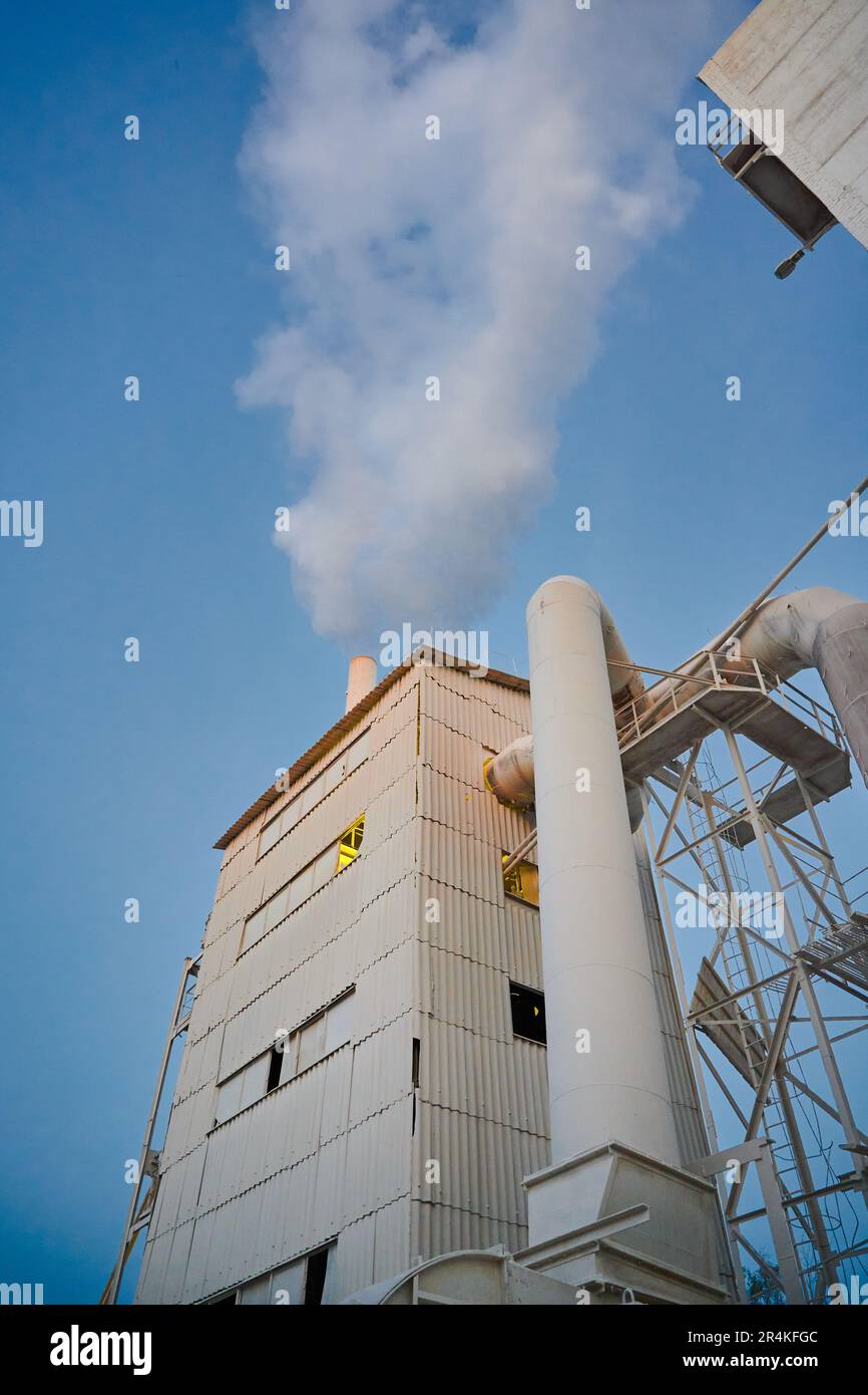 Building of loading device of roasting rotary furnace Stock Photo - Alamy