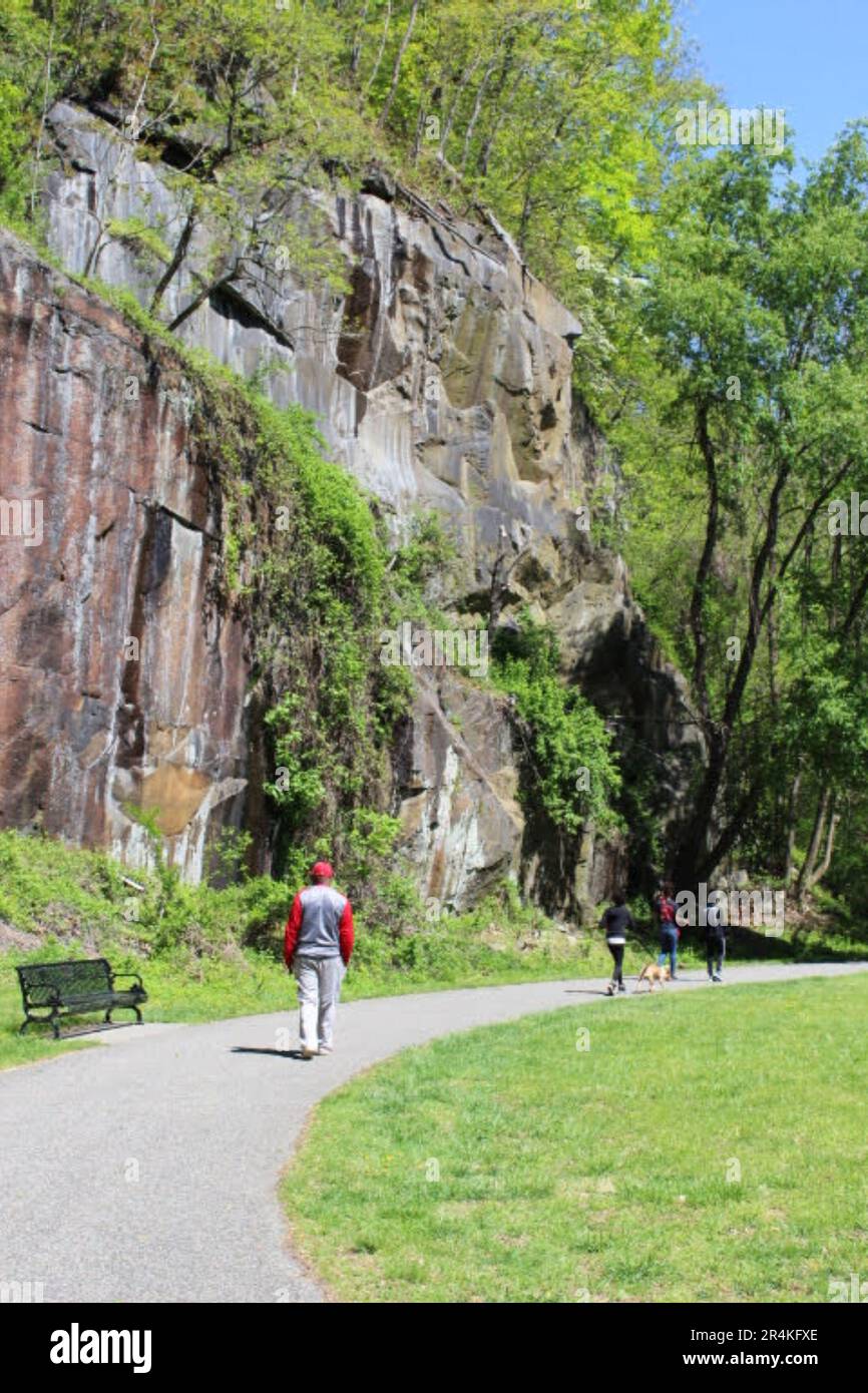Man walking on a paved trail hi-res stock photography and images - Alamy