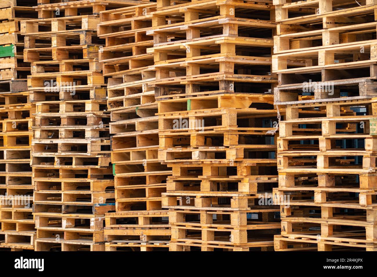 Stack of wooden pallet. Industrial wood pallet at factory warehouse ...