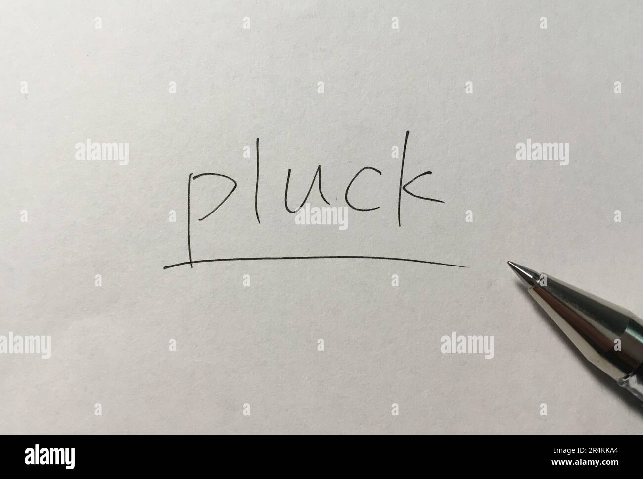 Pluck concept word on paper background Stock Photo - Alamy