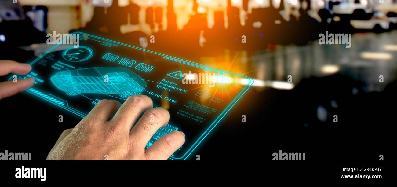 Mechanic man using EV electric vehicle analysis display screen in ...
