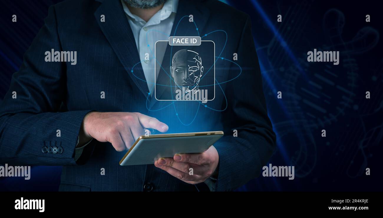 Man using tablet with face id scan and modern technology. Login using ...