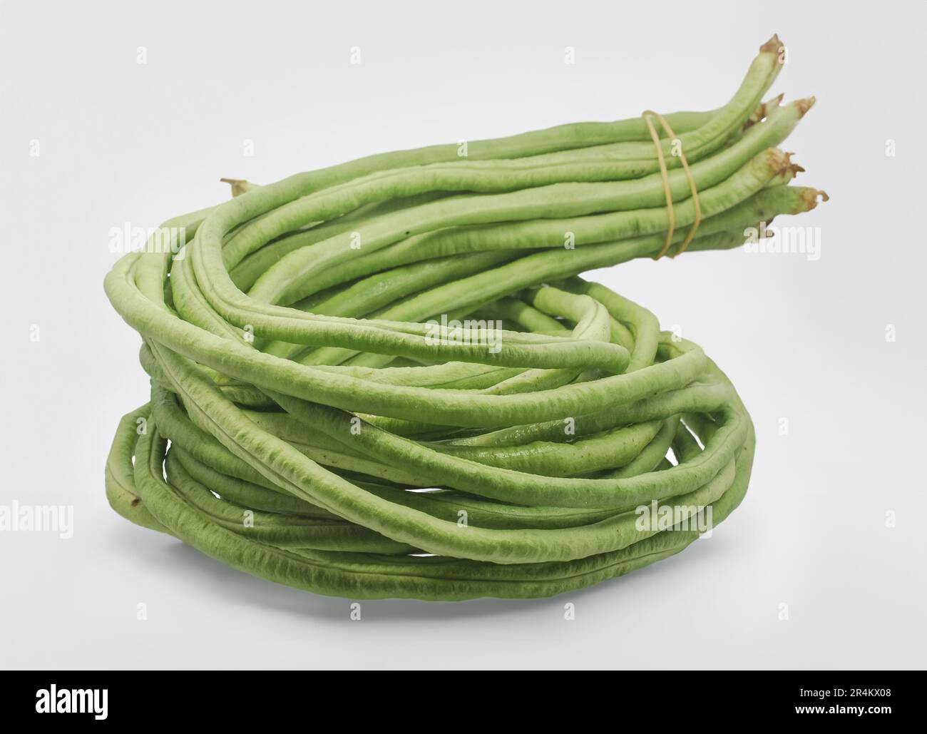 Fresh green long bean isolated on white background Stock Photo - Alamy
